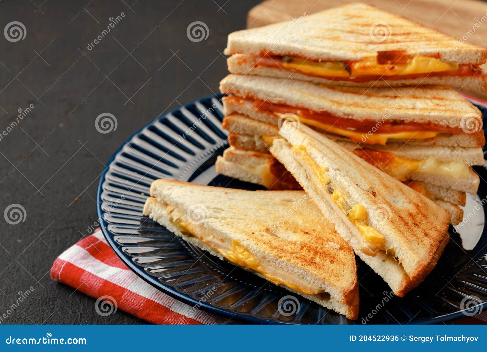 Stack of Triangle Sandwiches in Plate Close Up Stock Photo - Image of ...