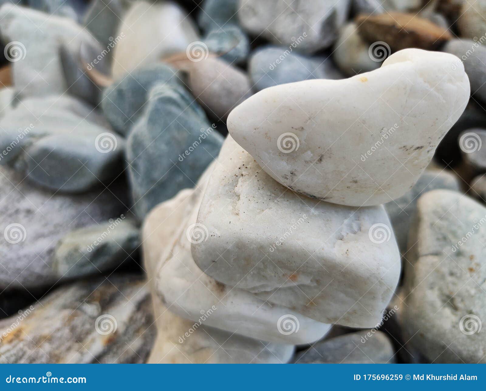Stack of Triangular Stones.Group of White and Colorful Stones.Pebble ...