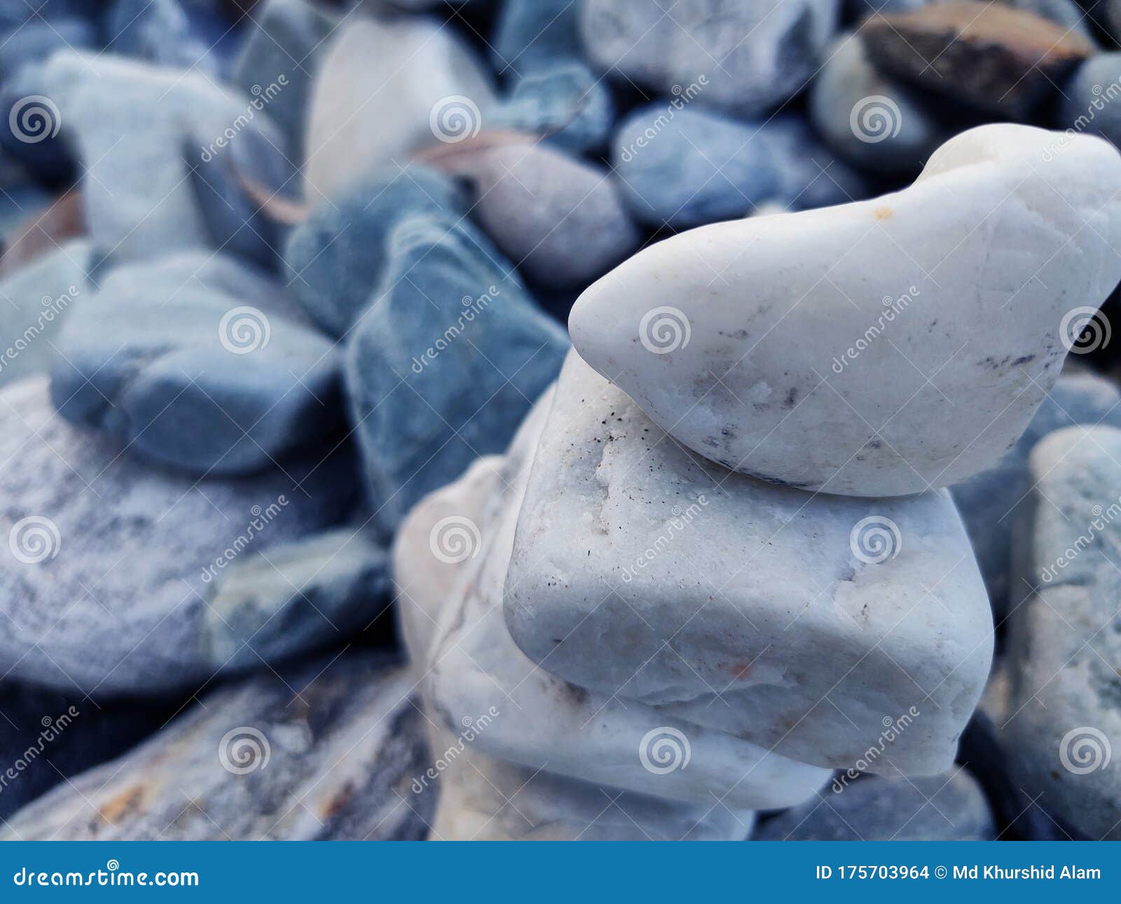 Stack of Triangular Stones.Group of White and Colorful Stones.Pebble ...