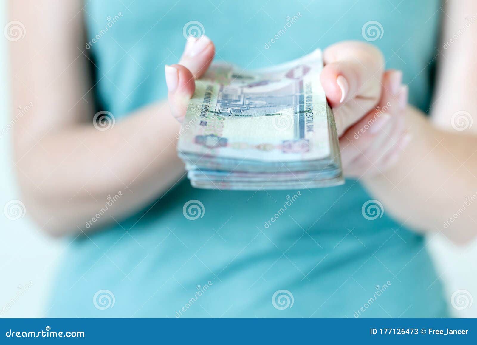 Stack of UAE Dirhams in Woman`s Hands. Closeup. Stock Image - Image of ...