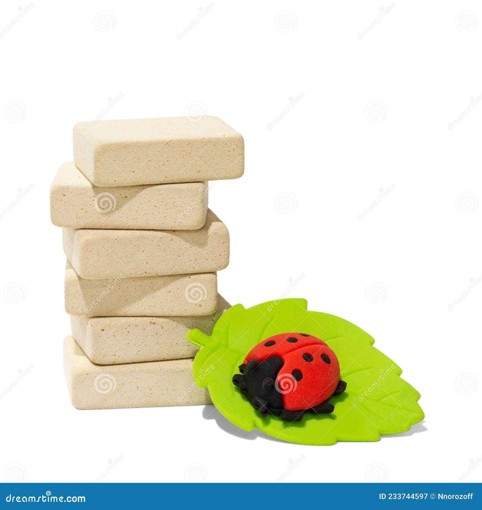 Stack of Uniform Stationery Erasers and Eraser for Kids on White ...