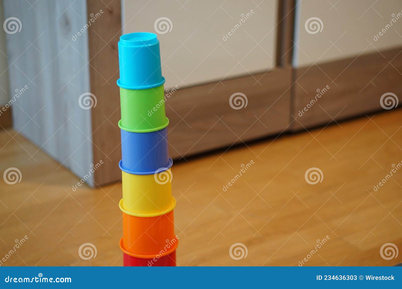 Stack Up Cups Arranged on the Floor; a Background with Copy Space Stock ...