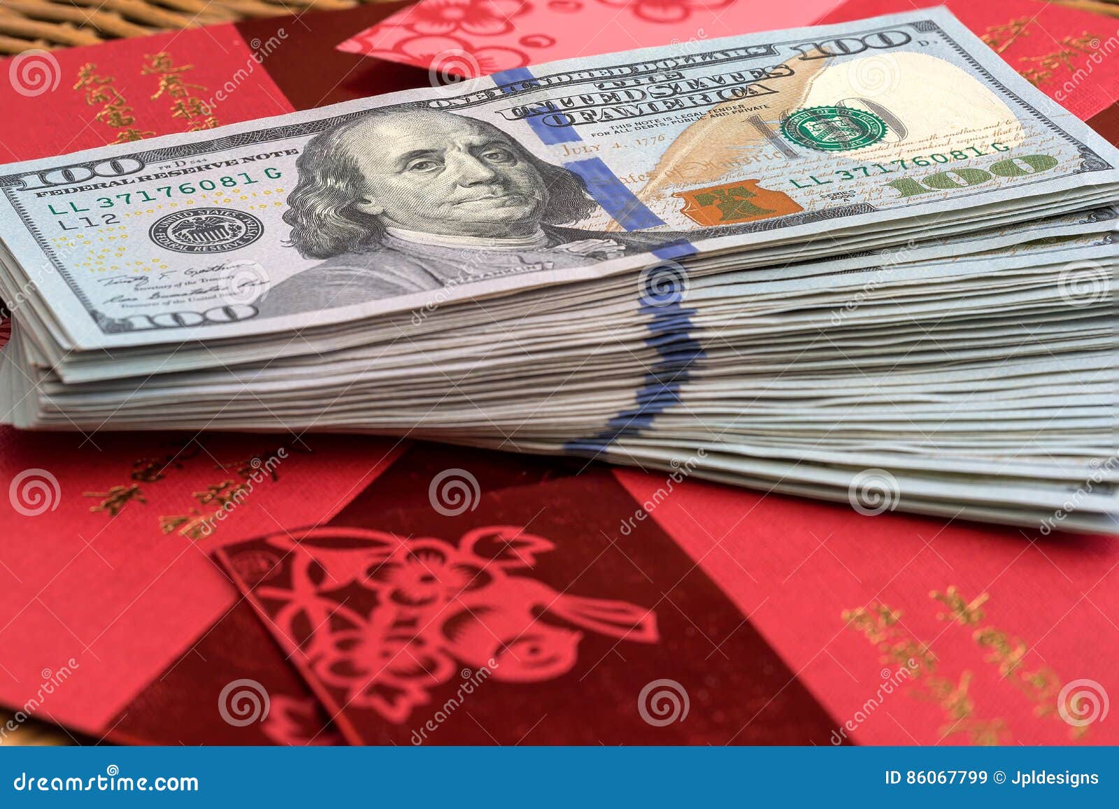 Stack of USD 100 Dollars on Chinese Red Packet Background Stock Image ...