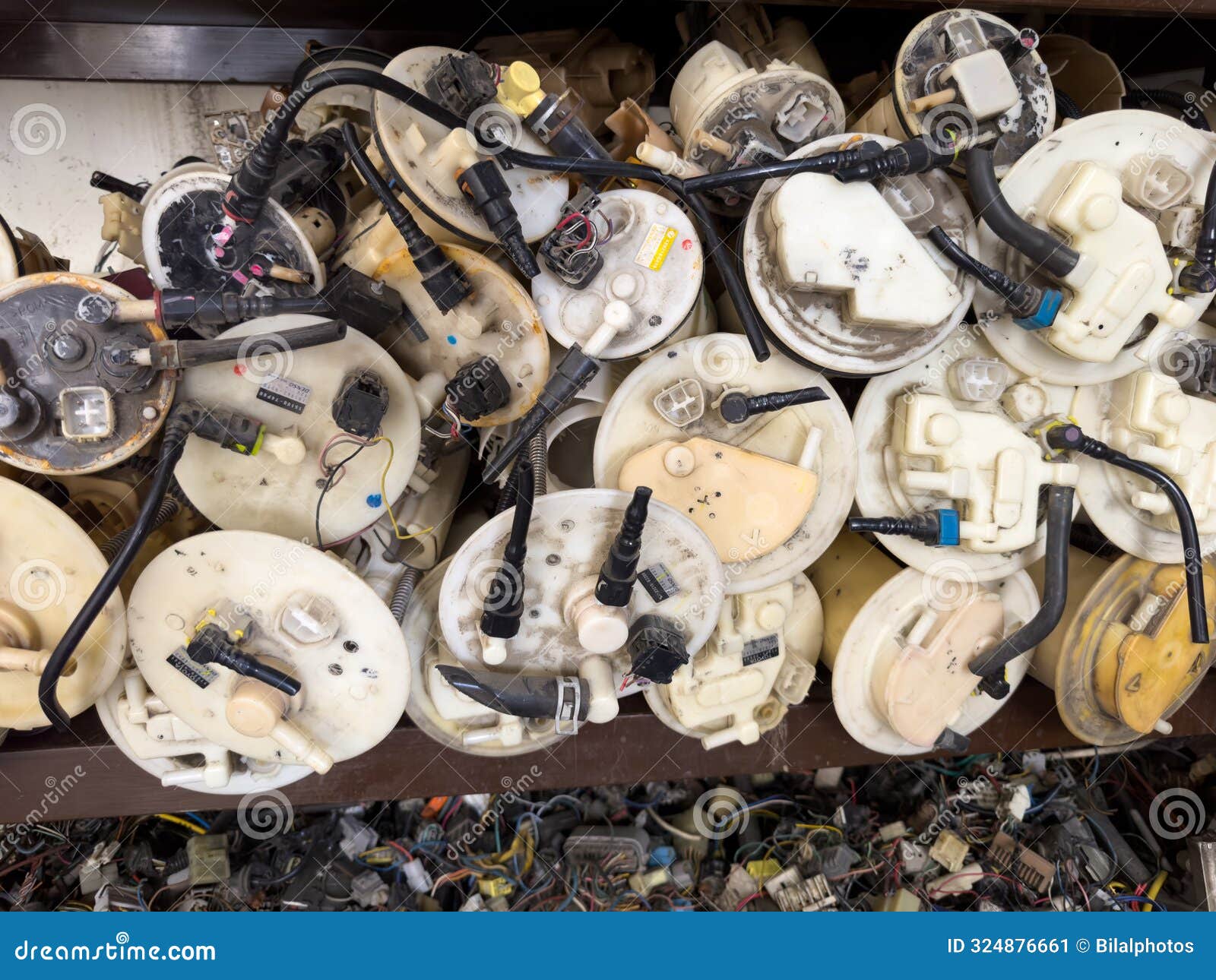 Stack of Used Fuel Pump Assemblies: Pakistan - 03 July 2024 Editorial ...