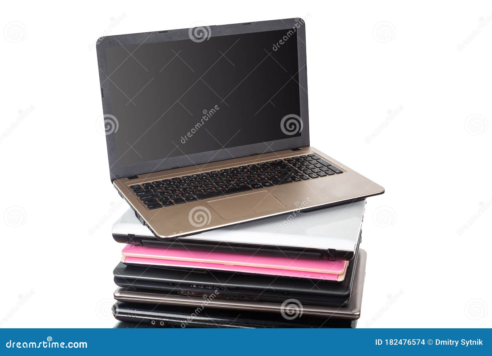 Stack of Used Laptops in Different Colors and Models. T Stock Photo ...