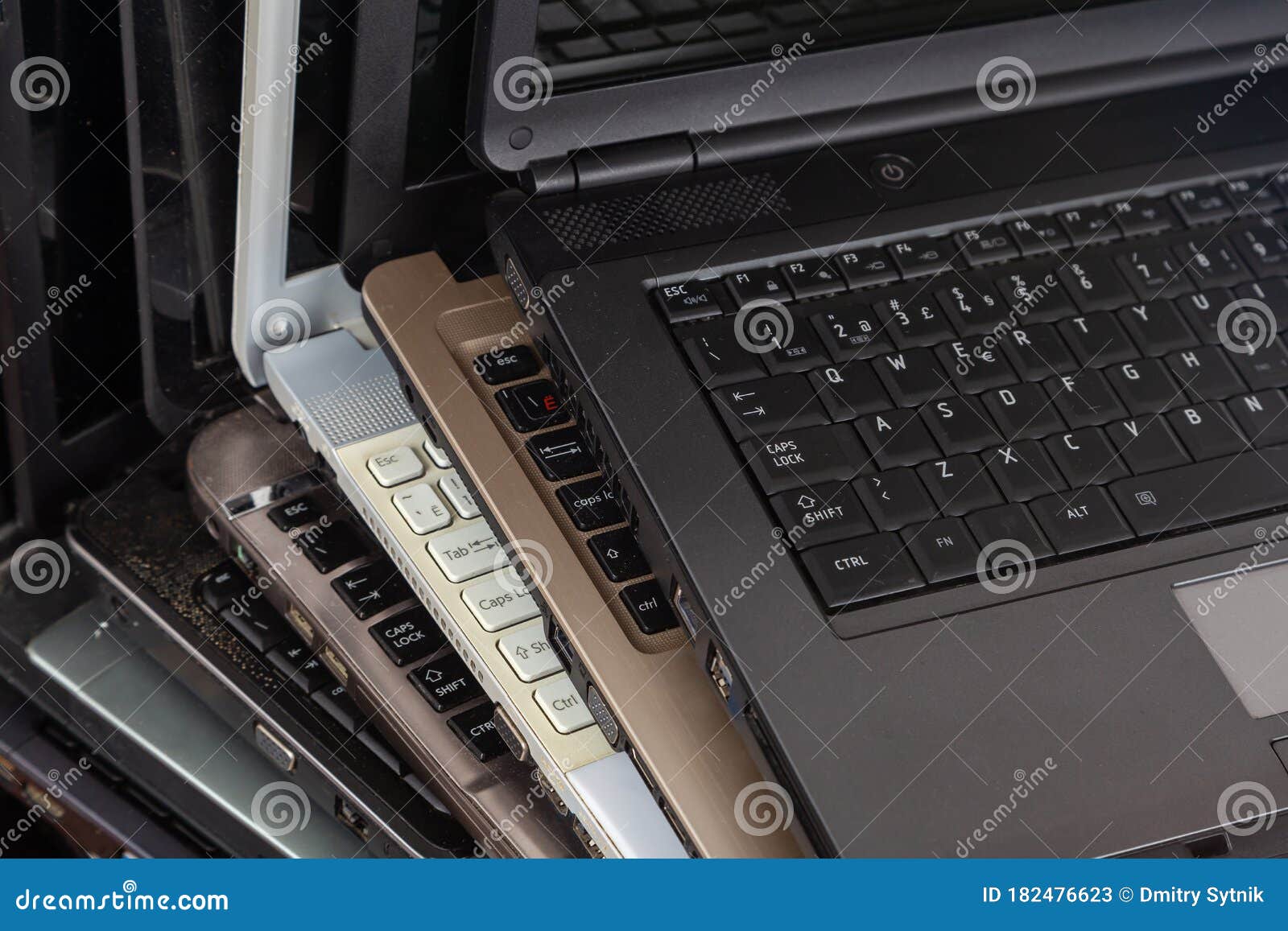 Stack of Used Laptops in Different Colors and Models. T Stock Image ...