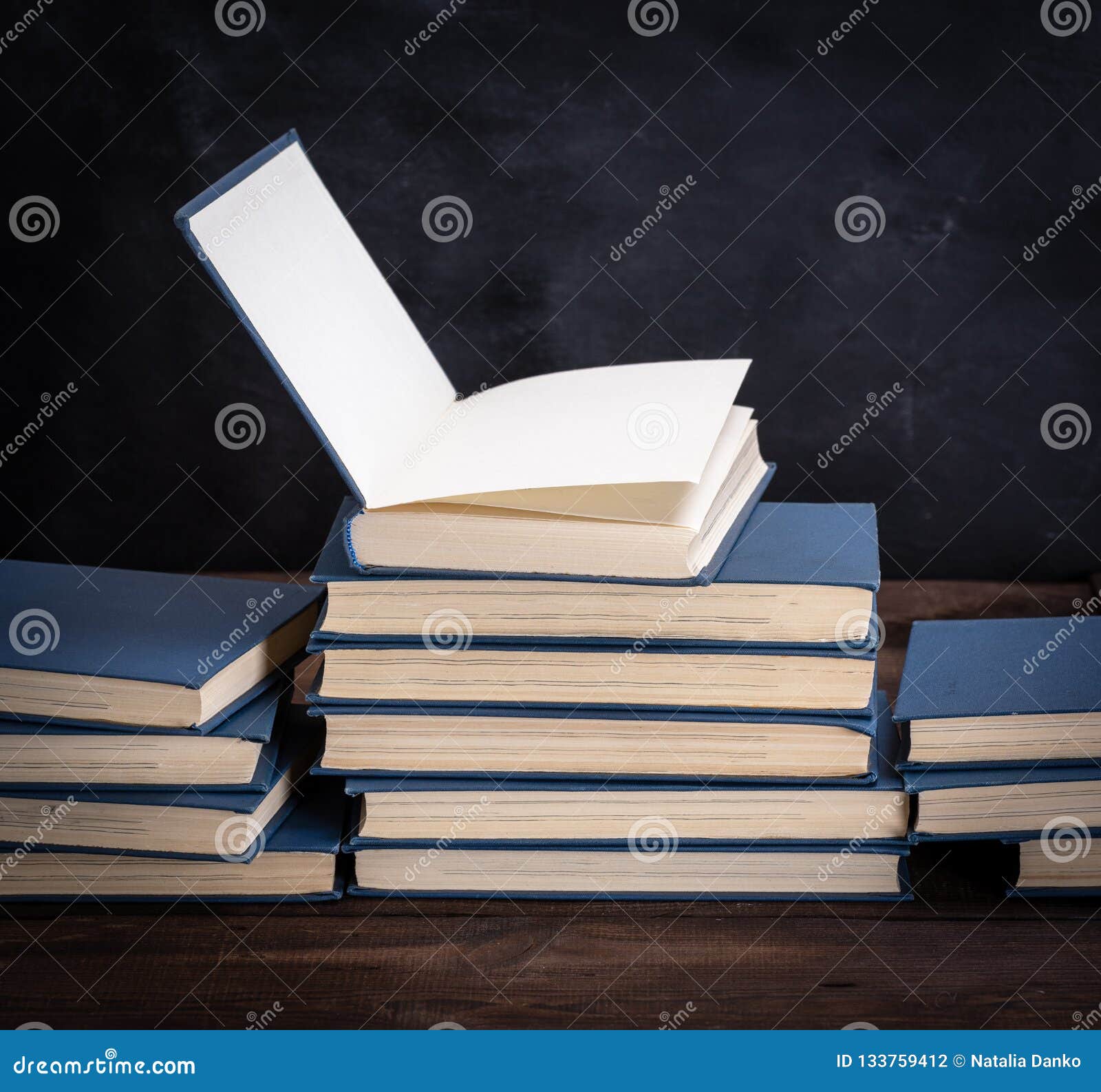 Stack of Various Books, Open Book on Top Stock Photo - Image of ...