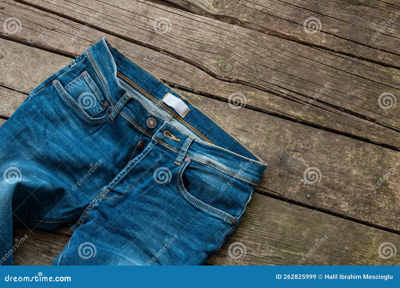 Stack of Various Denim Jeans, Trousers on Stone Rustic Background Stock ...