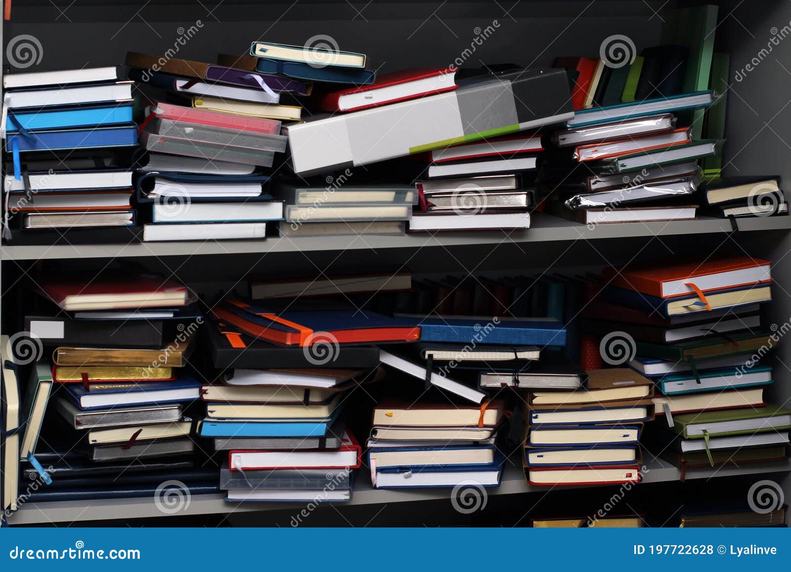 Stack of Various Leather-bound Diaries or Books in a Gray Bookcase ...