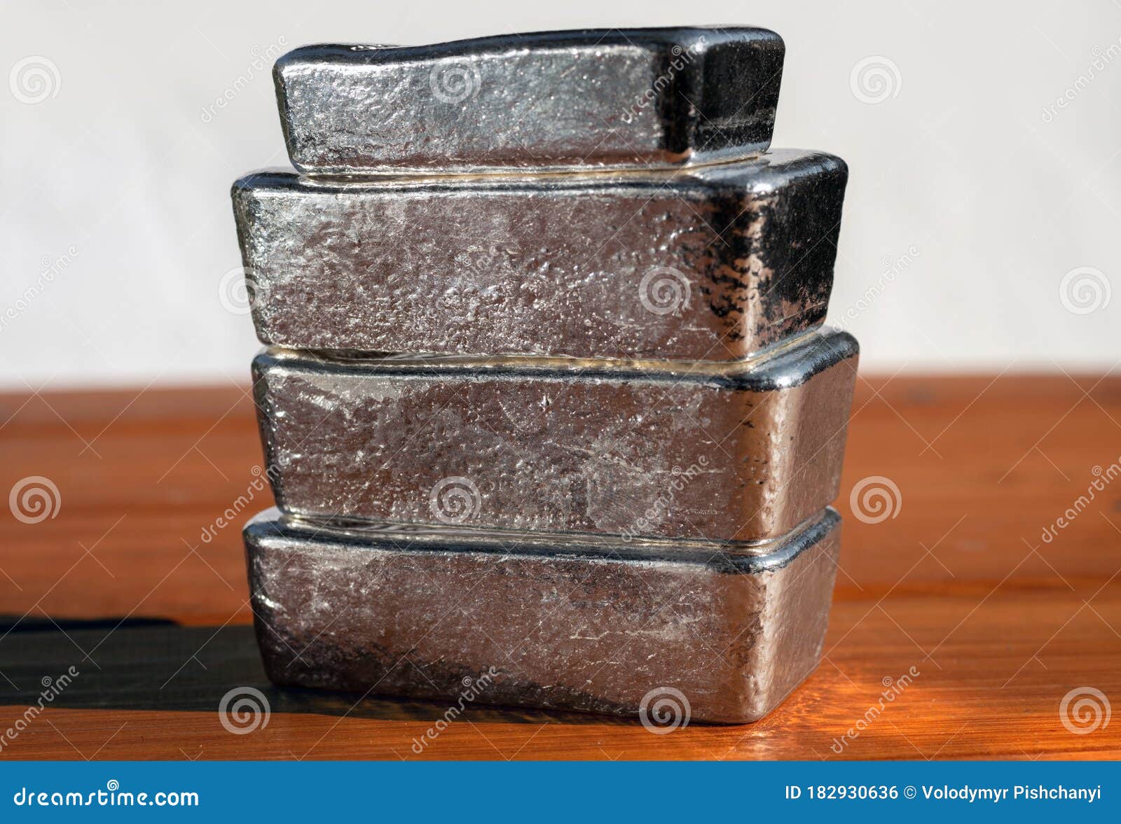 A Stack of Various Silver Bars on a Table. Stock Photo - Image of ...