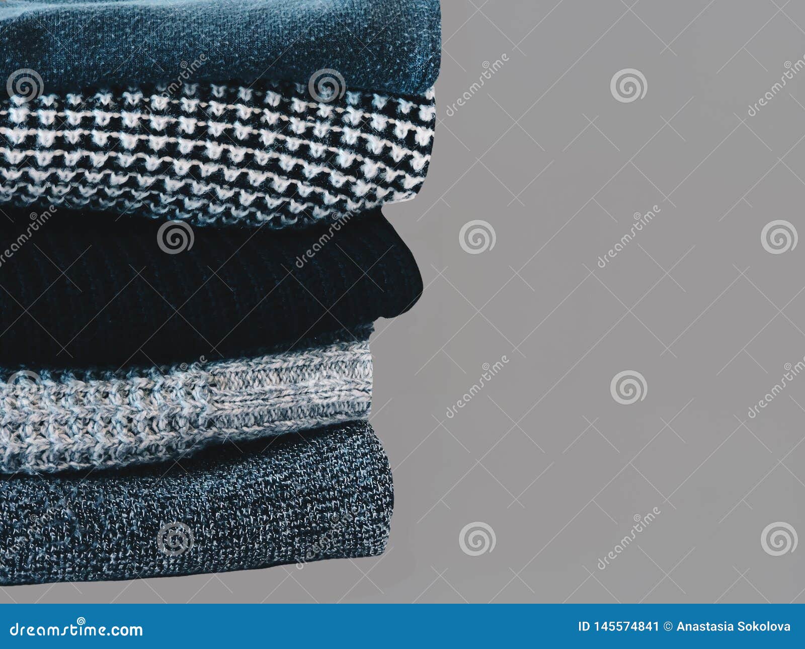 Stack of Various Sweaters Isolated on White Background. Knitted Wool ...