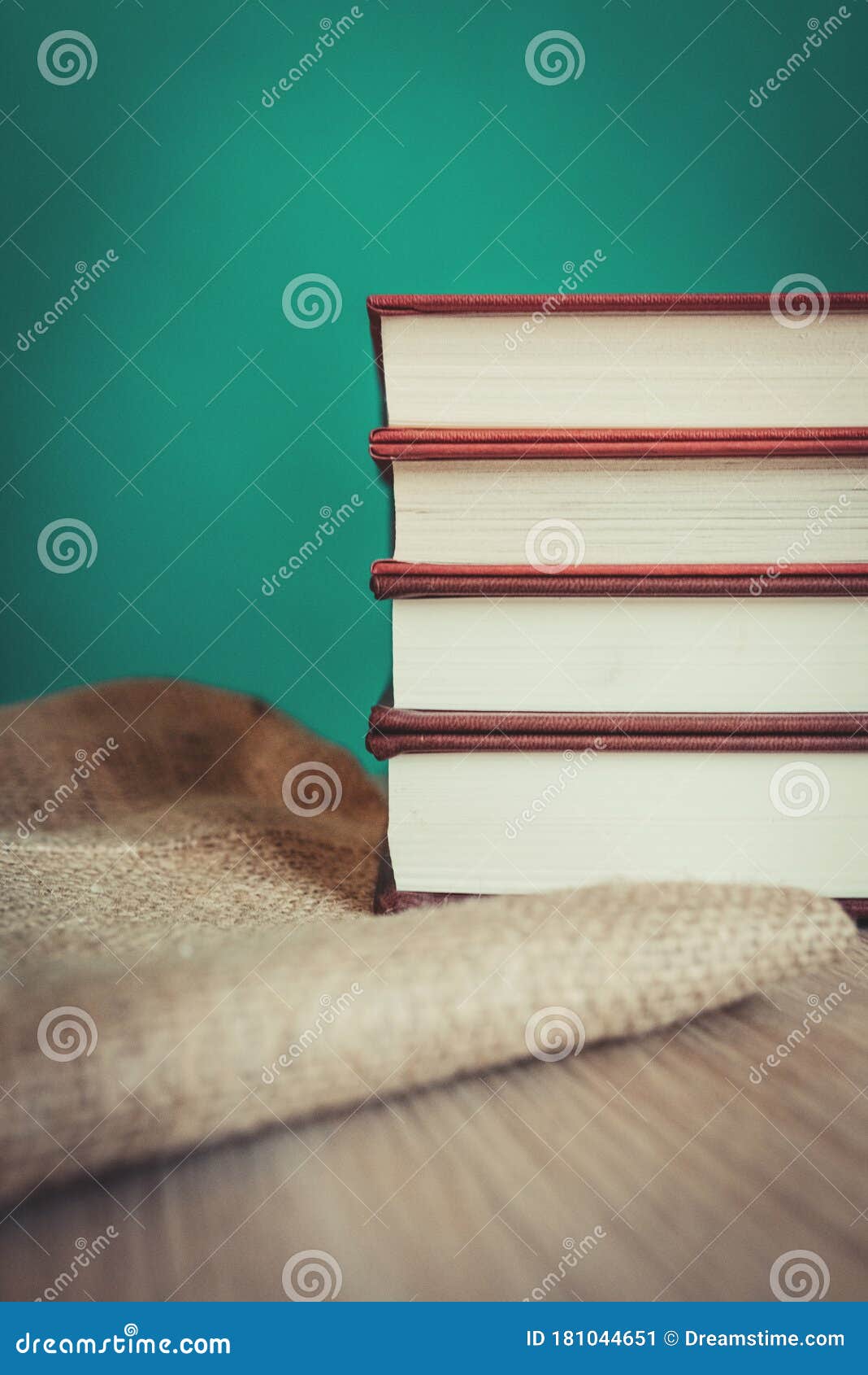Stack of Vintage Books on a Blue Background Stock Image - Image of ...