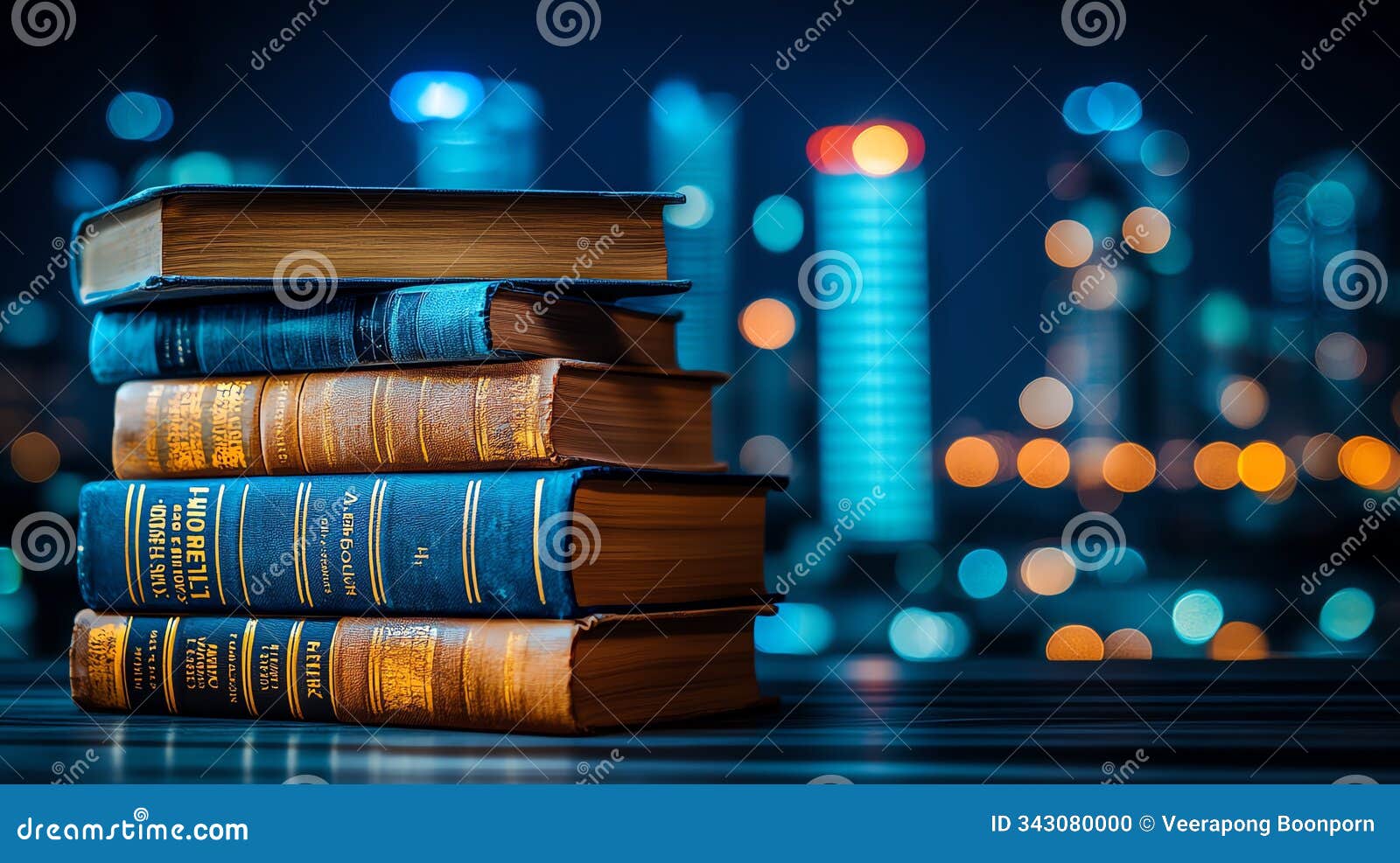 Stack of Vintage Books on a Table with a Blurred City Background at ...