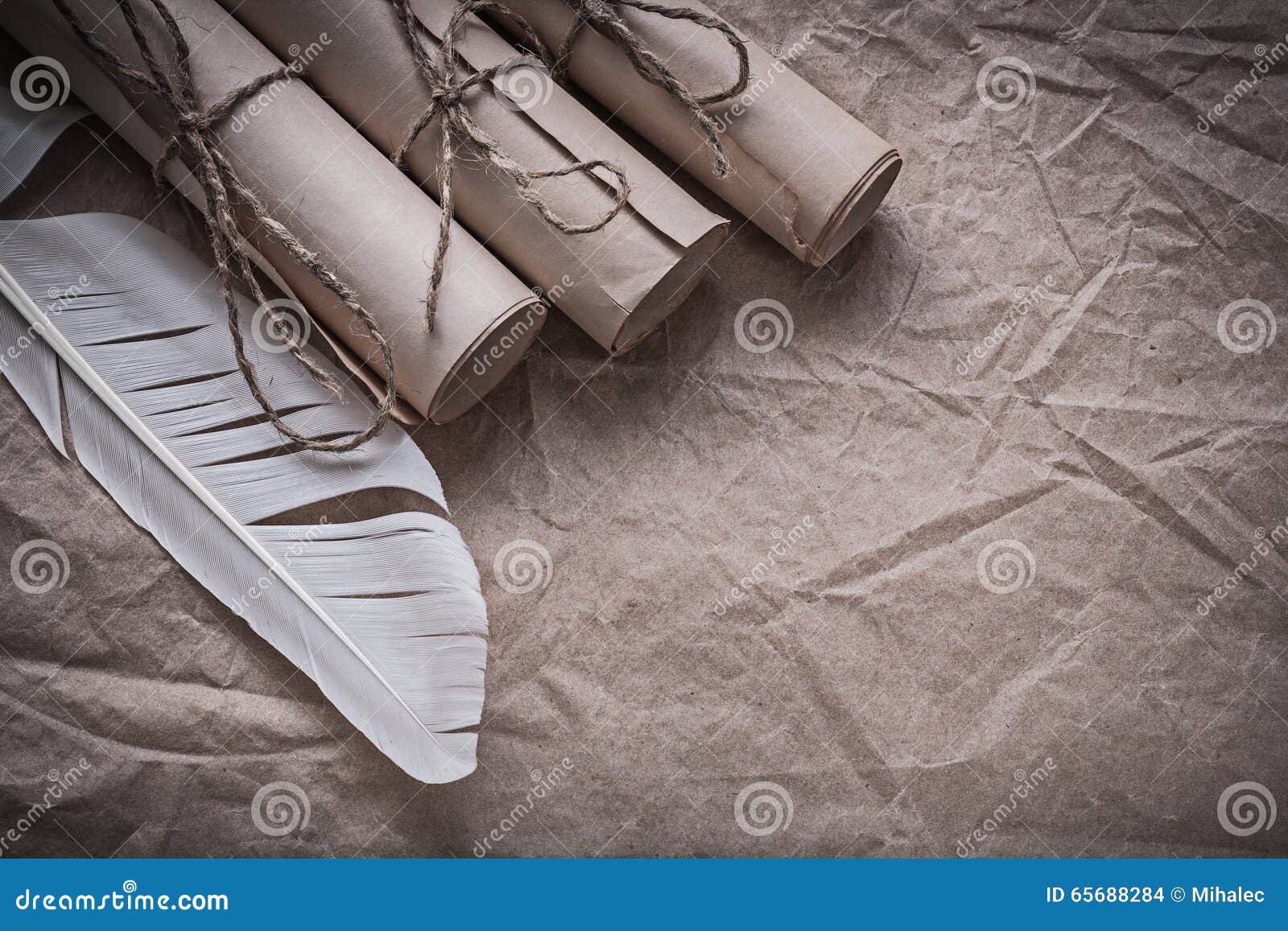 Stack of Vintage Paper Scrolls Quill on Crumpled Wrapping Sheet Stock ...
