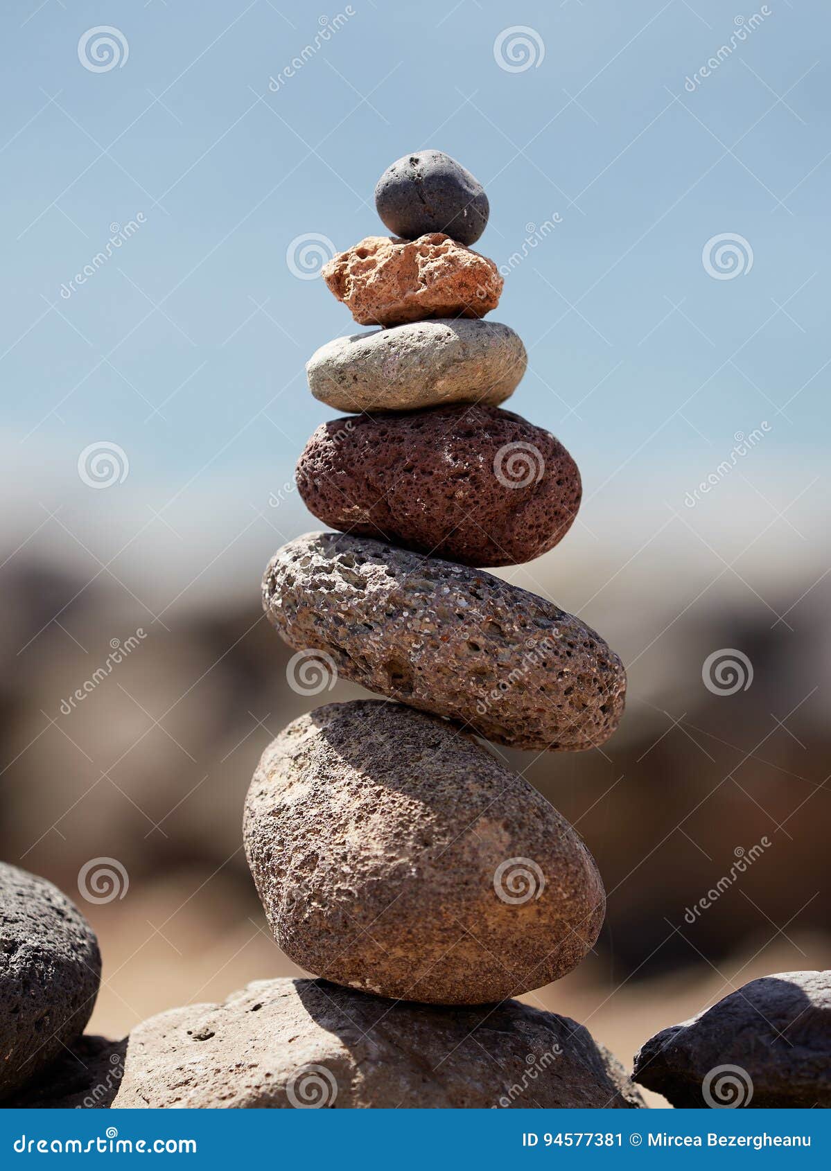 Stack of Volcanic Stones on the Beach Stock Image - Image of golden ...