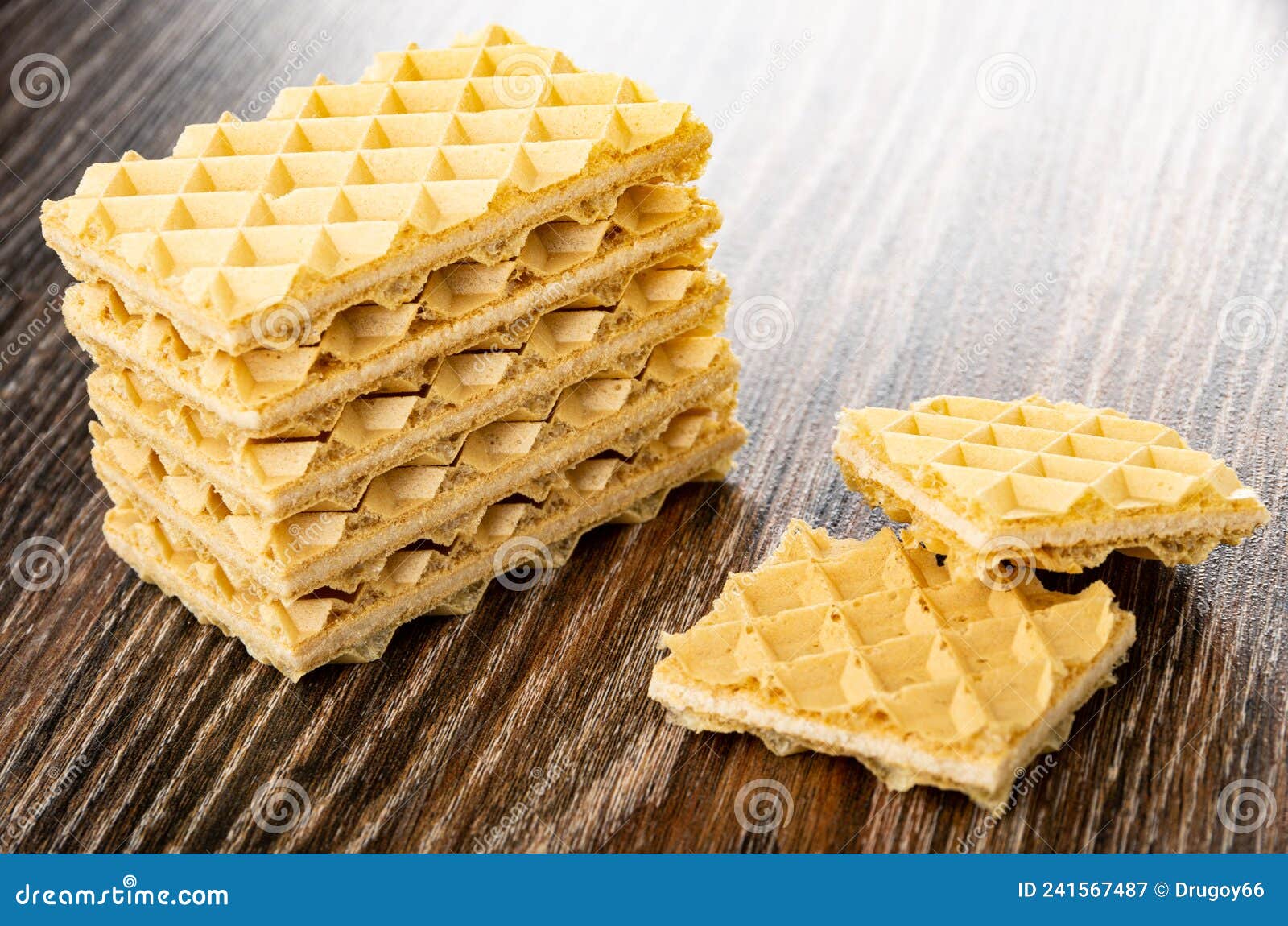 Stack of Wafers with Filling, Halves of Wafer on Wooden Table Stock ...