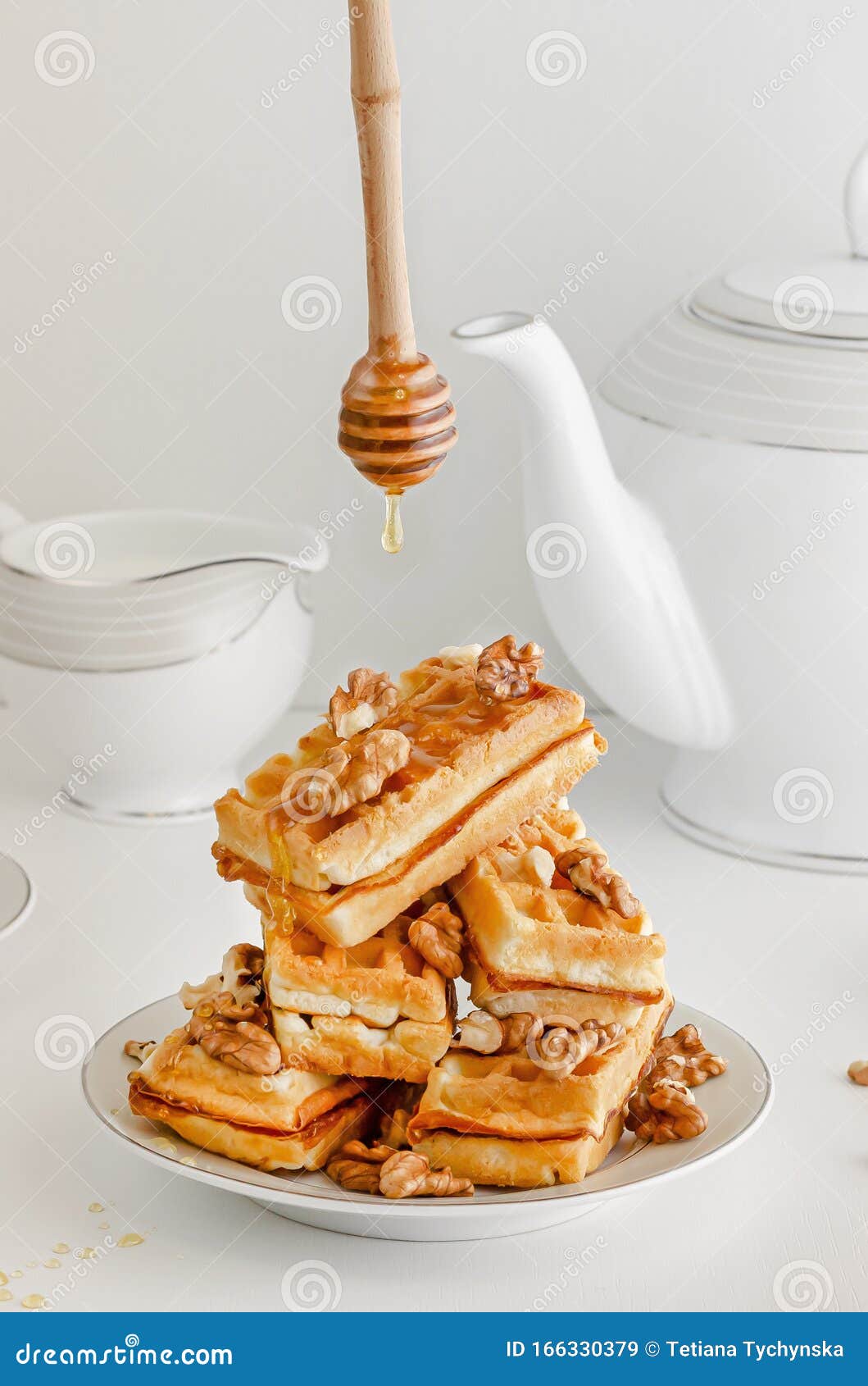 Stack of Waffles with Honey and Walnuts on White Background. Sweet ...