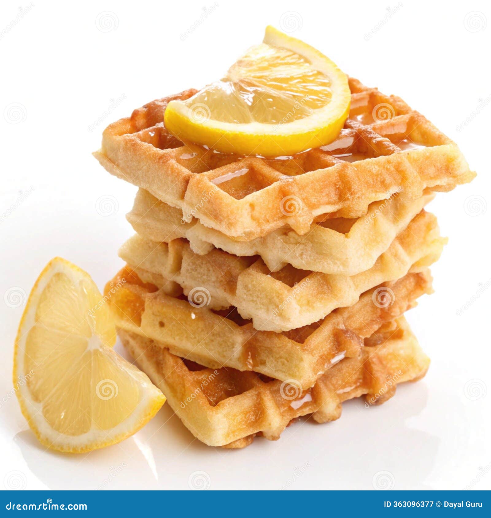 A Stack of Waffles with a Lemon Wedge Isolated on White Background ...