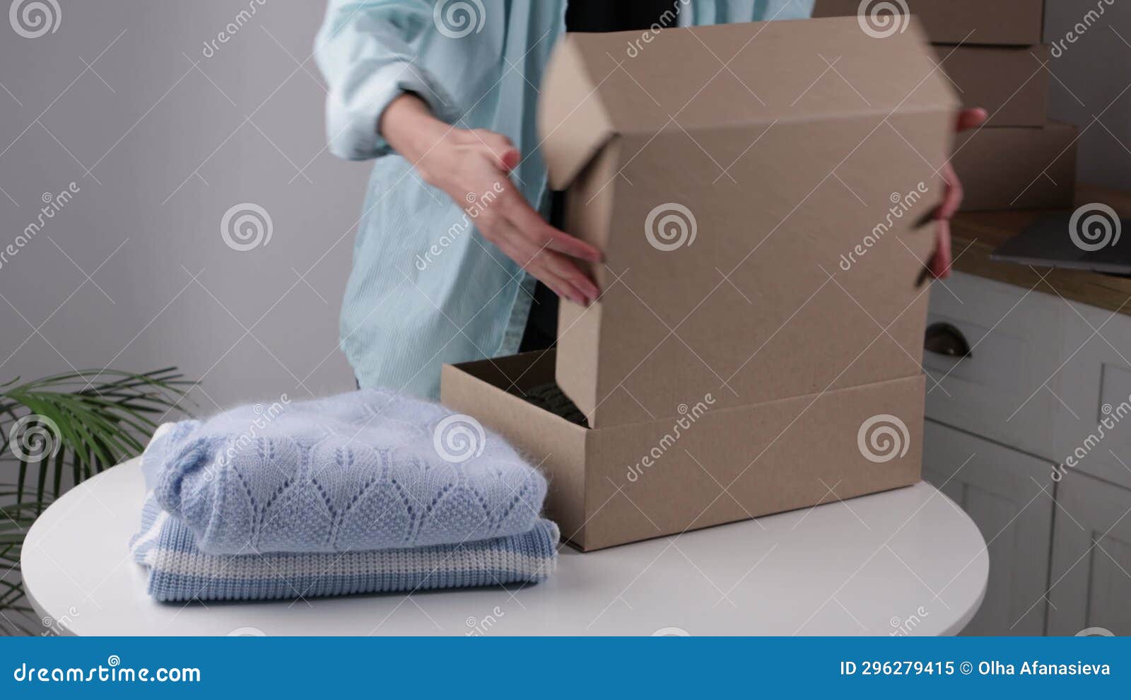 Stack of Warm Clothing Preparing for Packing in Shipping Boxes Stock ...