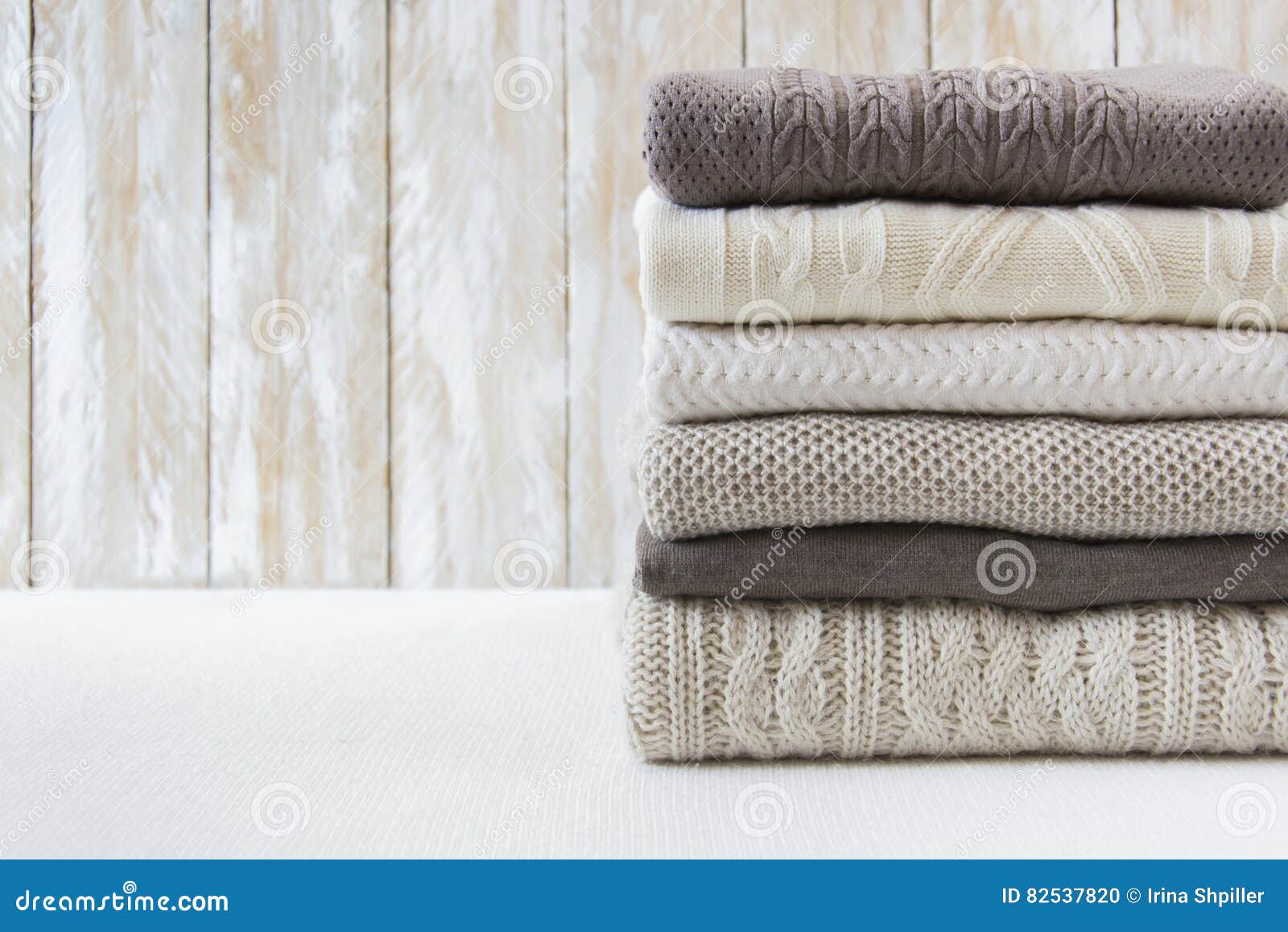 Stack of warm sweaters stock photo. Image of weather - 82537820