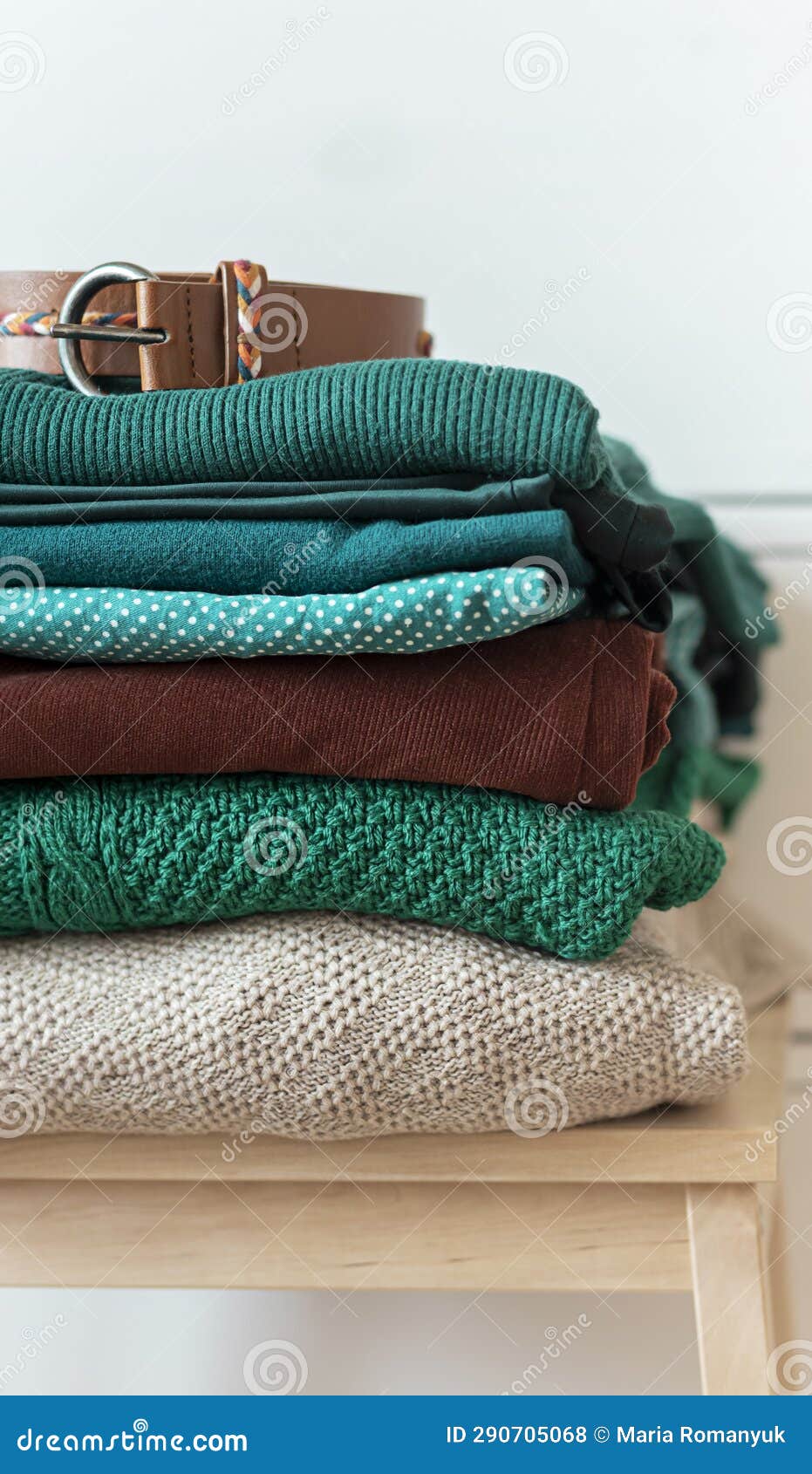 Stack of Warm Wool and Cotton Clothes with the Belt. Textile Texture ...