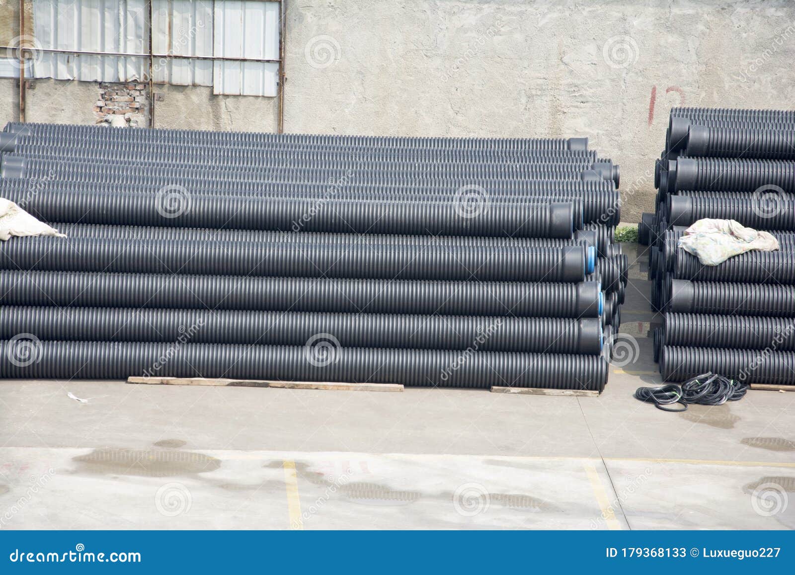 A stack of water pipes stock image. Image of sunlight - 179368133