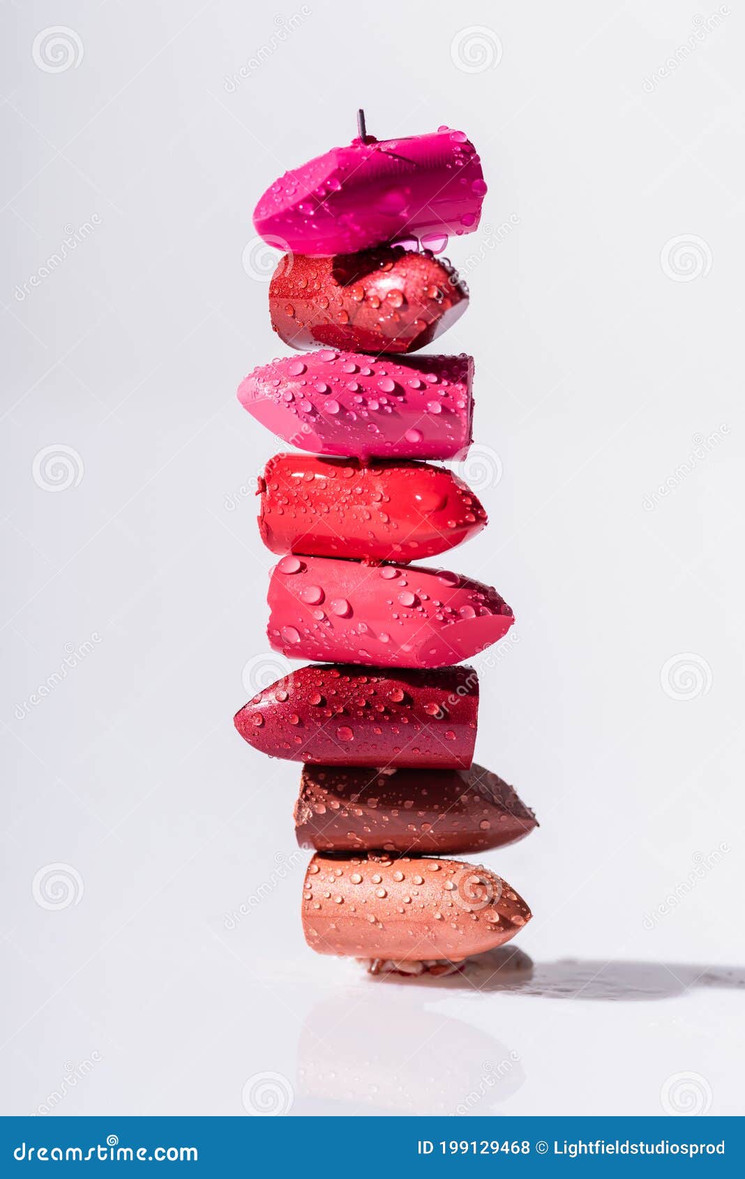 Stack of Wet Colorful Lipsticks on Stock Photo - Image of backdrop ...