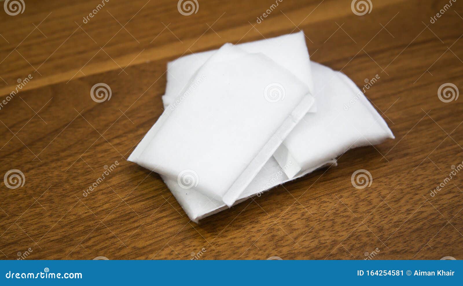 Stack of White Cotton Pad on a Wooden Table Background Stock Image ...