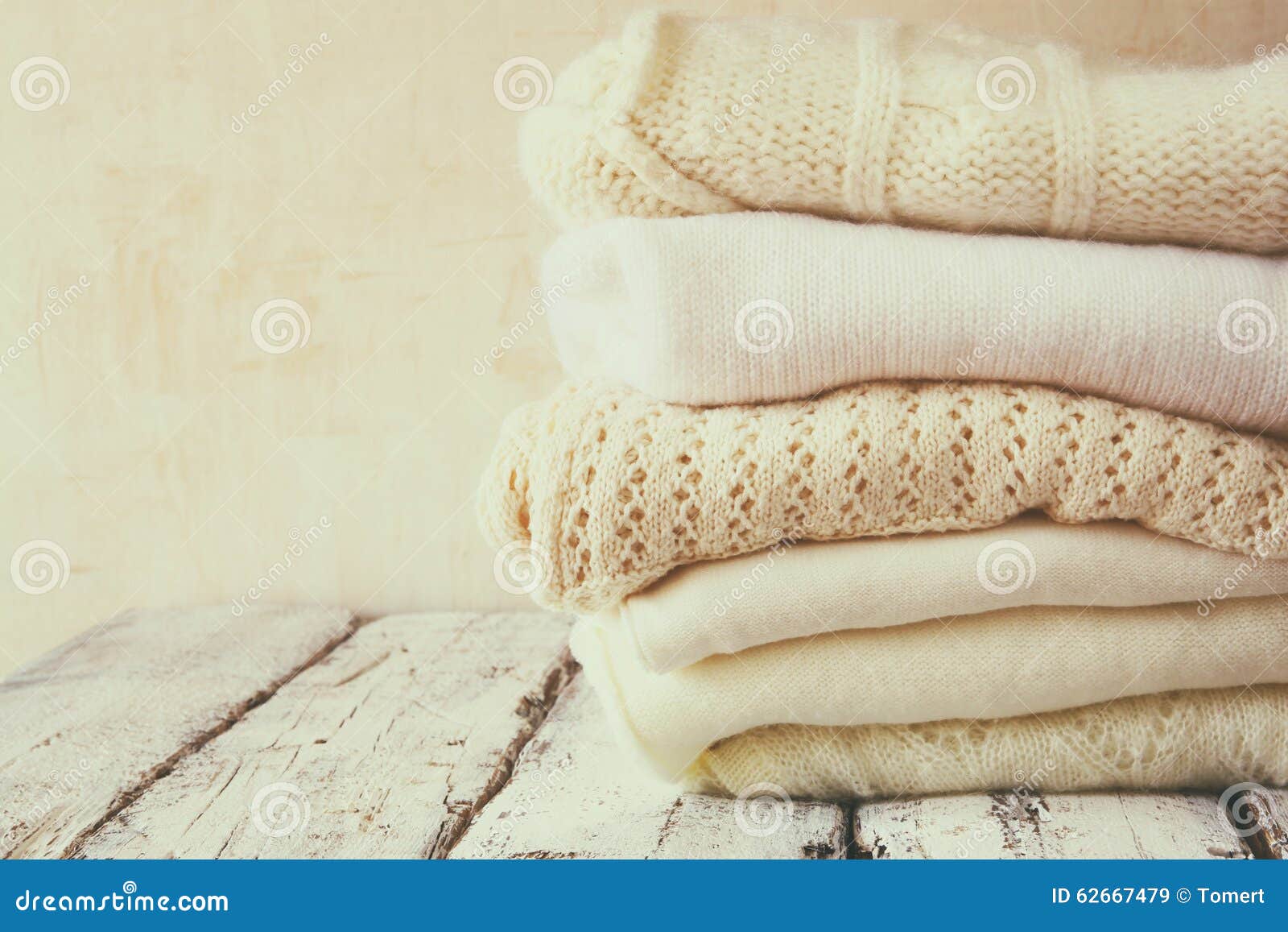 Stack of White Cozy Knitted Sweaters on a Wooden Table Stock Image ...