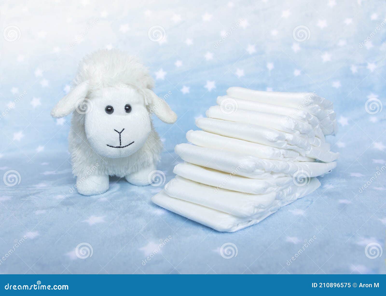 Stack of White Disposable Diapers for Little Babies on Blue Background ...