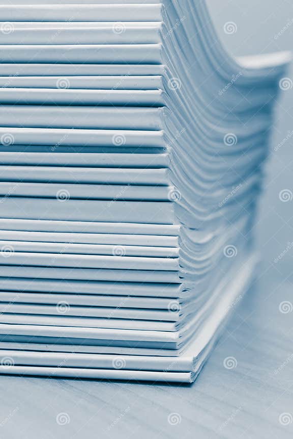 Stack of white journals stock image. Image of office - 22914305
