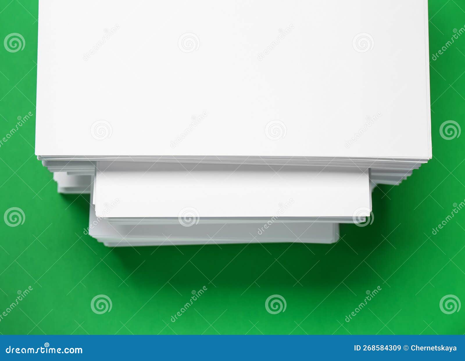Stack of White Paper on Green Background, Top View Stock Image - Image ...