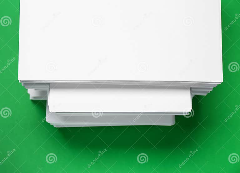 Stack of White Paper on Green Background, Top View Stock Image - Image ...