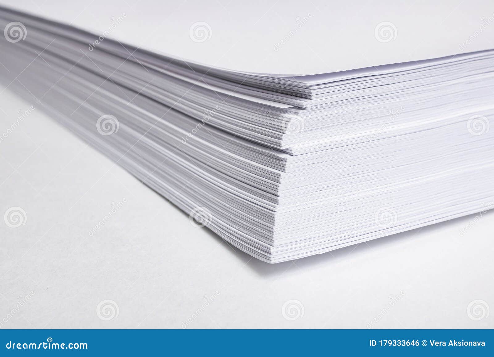 Stack of White Paper for Printer on Gray Background Stock Photo - Image ...