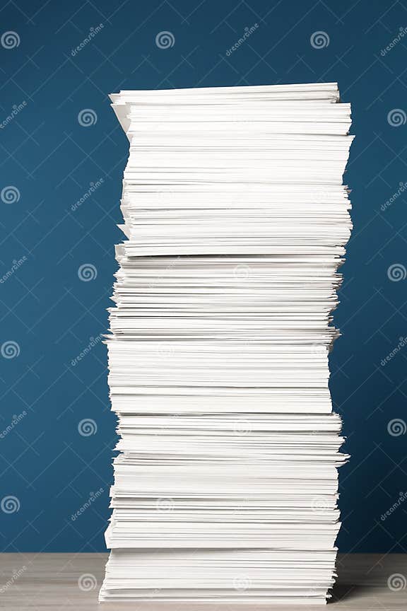 Stack of White Paper Sheets on Blue Stock Image - Image of business ...