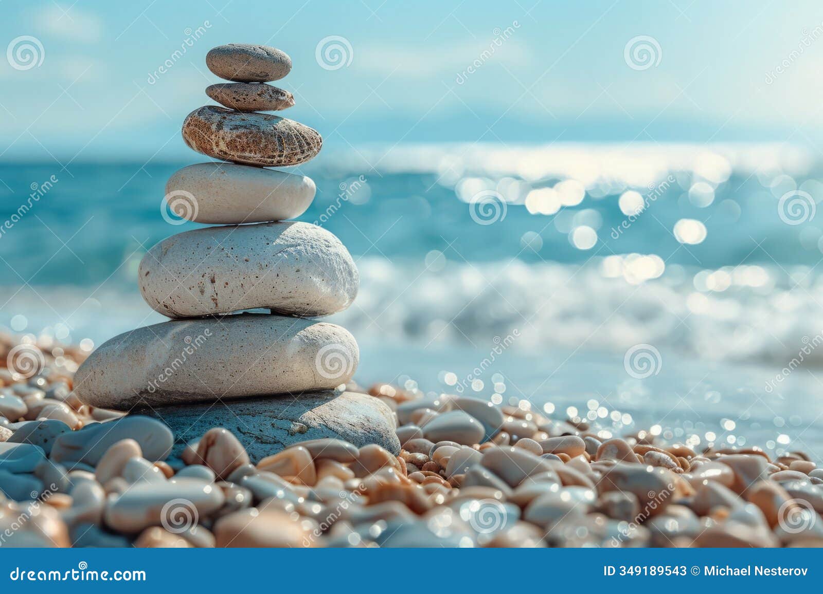 Stack of White Pebbles Balancing on the Beach Shore Stock Image - Image ...