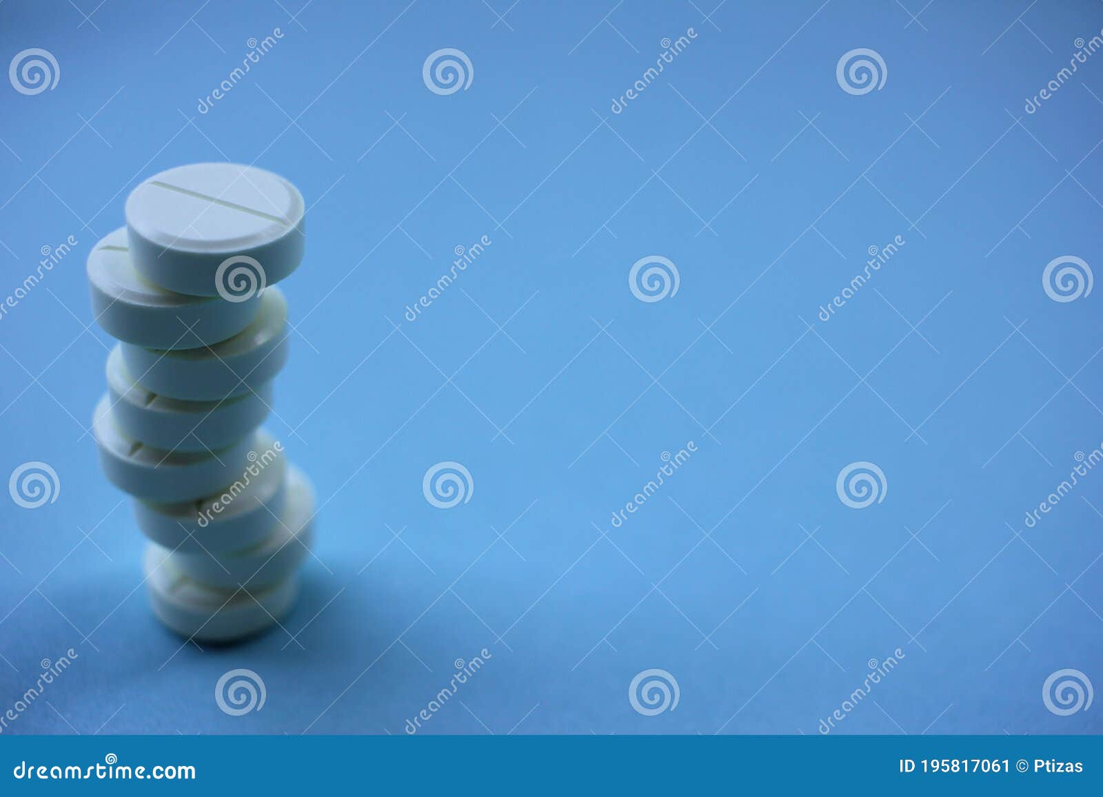 Stack of White Pills on Blue Background with Copy Space. Tower Made of ...