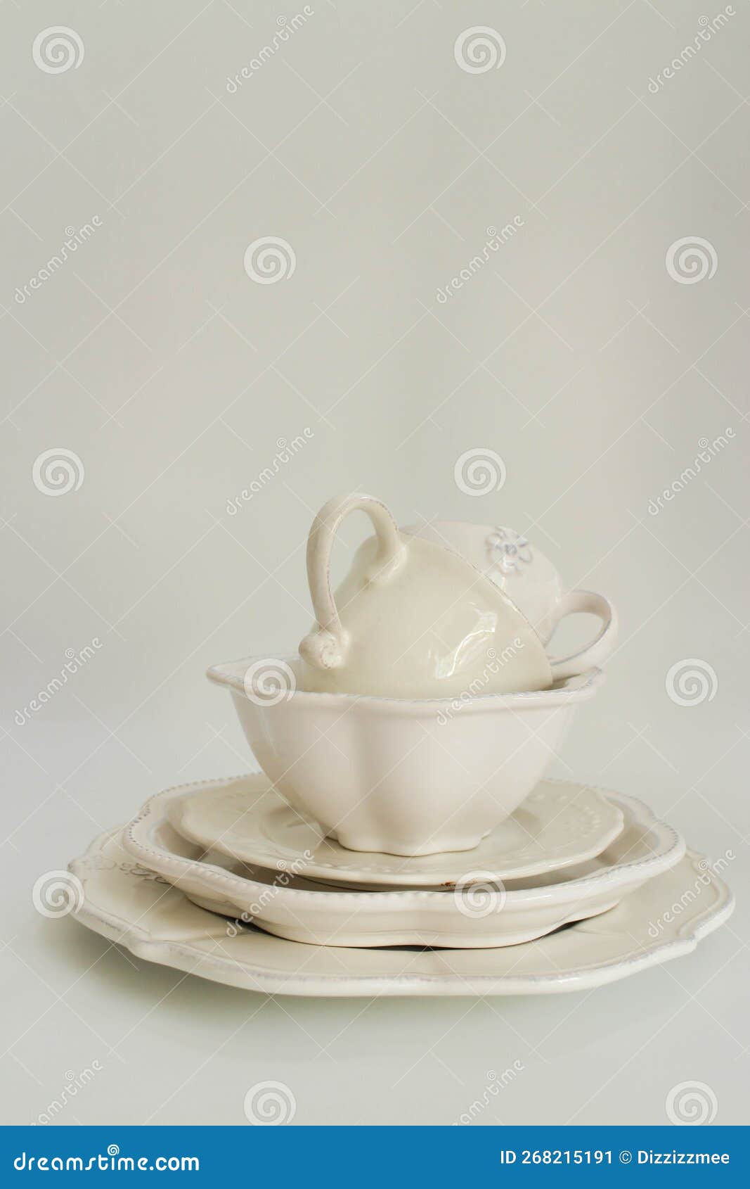 A Stack of White Plates and Cups on White Background Stock Image ...