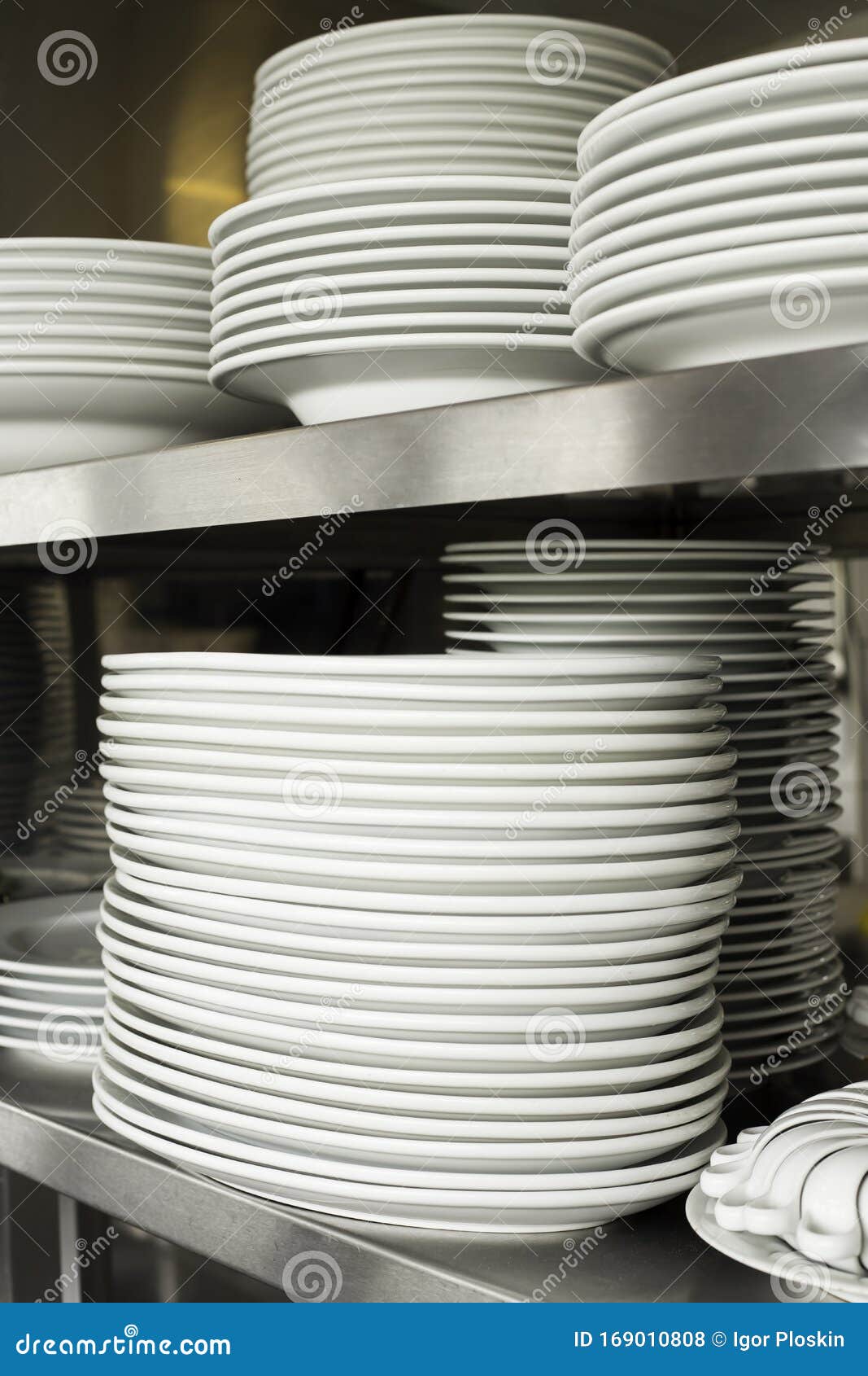 Stack of White Plates in the Kitchen Stock Photo - Image of kitchenware ...