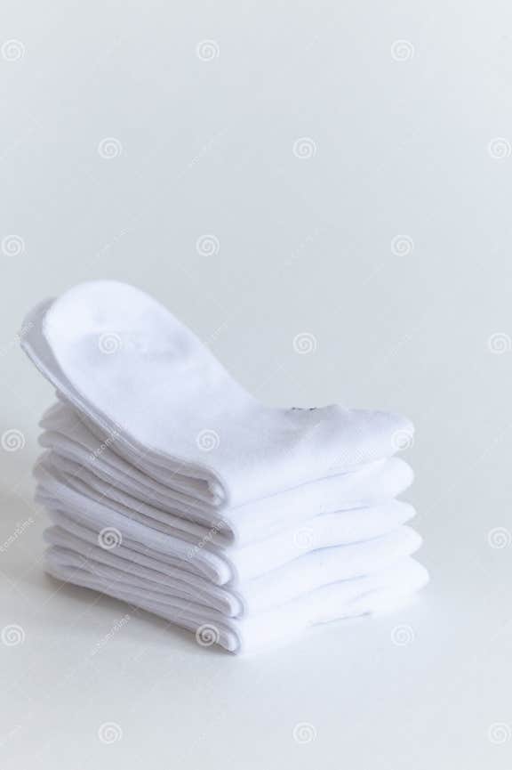 A Stack of White Socks on a White Background Stock Photo - Image of ...