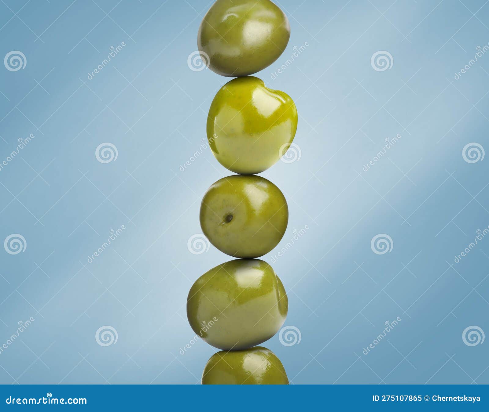 Stack of Whole Olives on Light Blue Background Stock Image - Image of ...