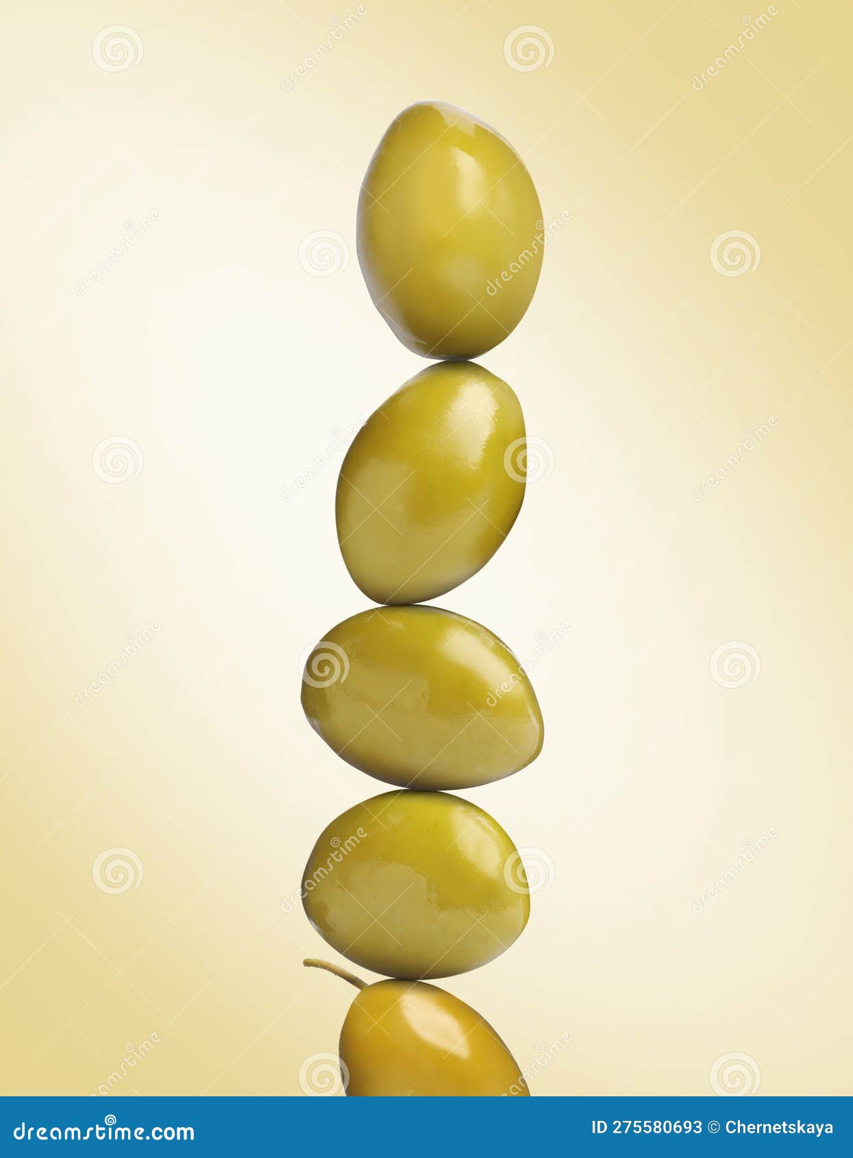 Stack of Whole Olives on Pastel Gold Background Stock Image - Image of ...