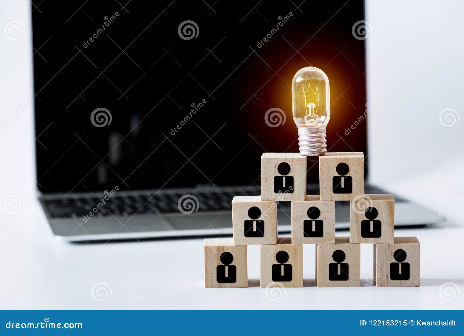 Stack of Wood Cube Building Blocks with Laptop Computer Backgro Stock ...