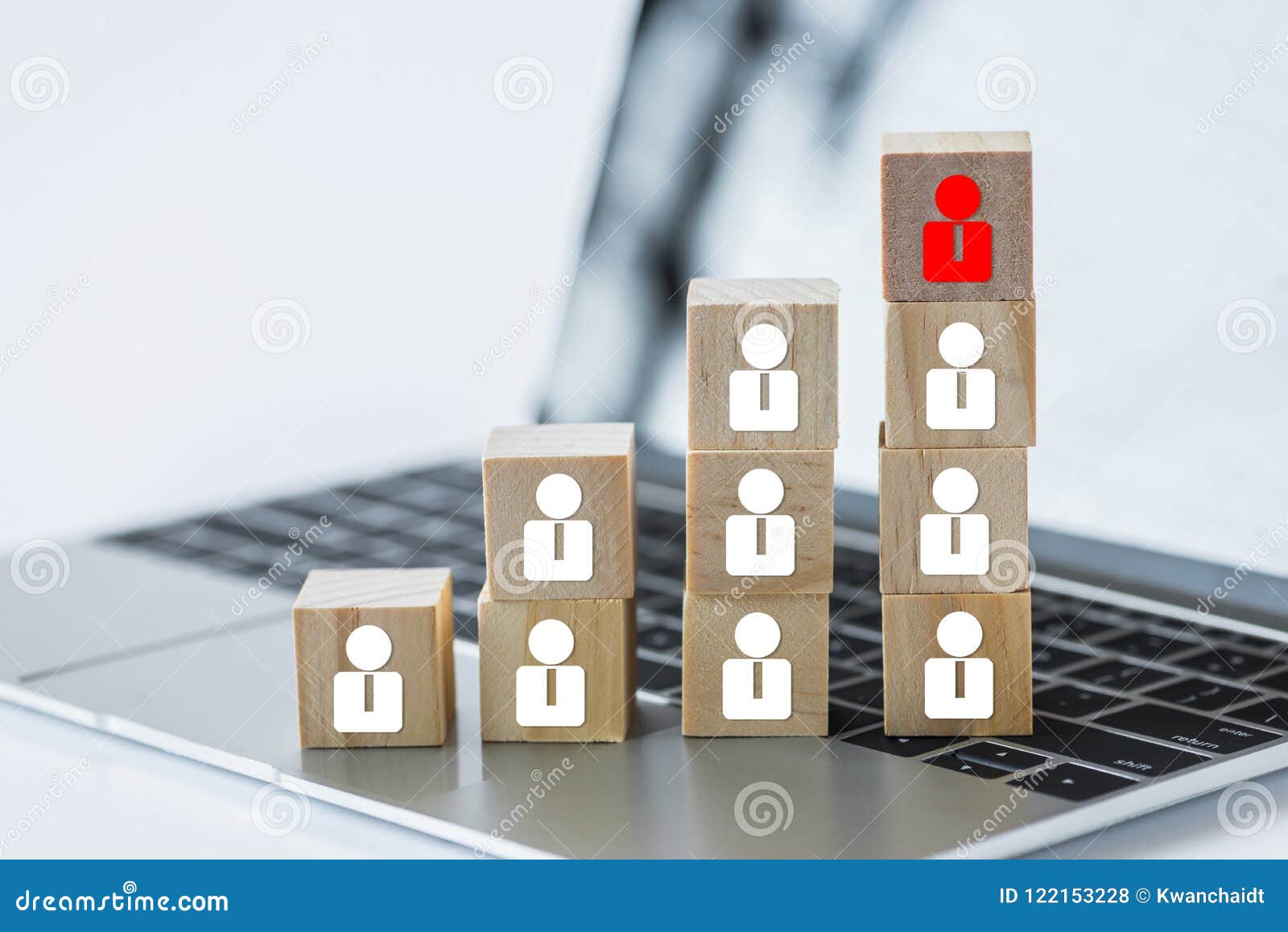 Stack of Wood Cube Building Blocks with Laptop Computer Backgro Stock ...