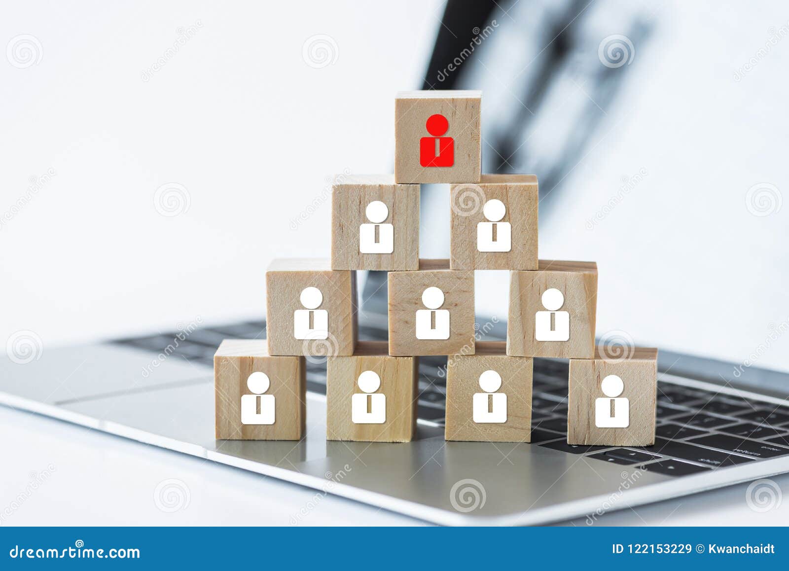 Stack of Wood Cube Building Blocks with Laptop Computer Backgro Stock ...