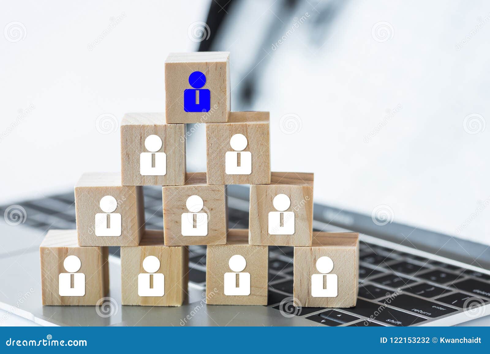 Stack of Wood Cube Building Blocks with Laptop Computer Backgro Stock ...