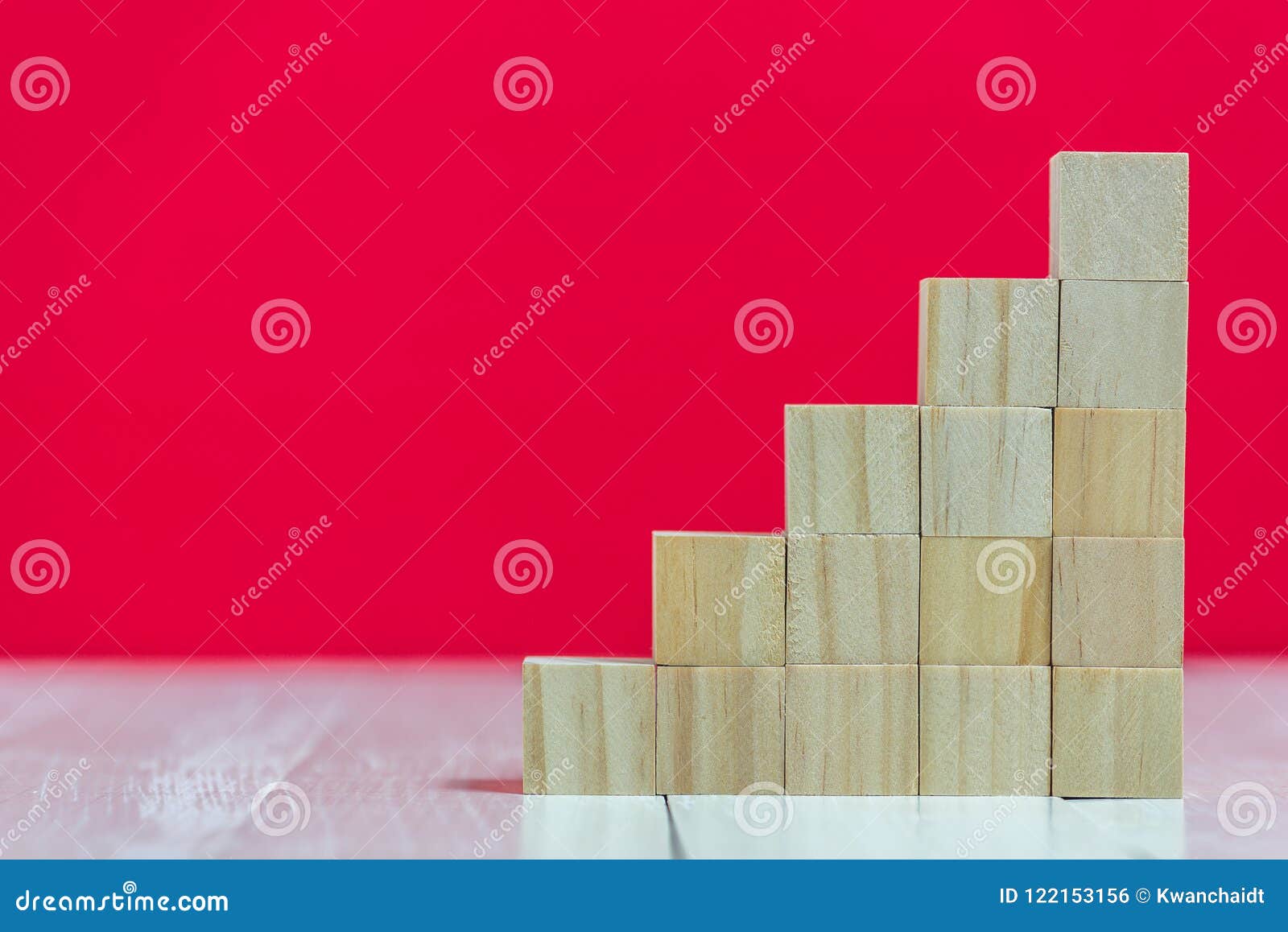Stack of Wood Cube Building Blocks on Red Background Stock Photo ...