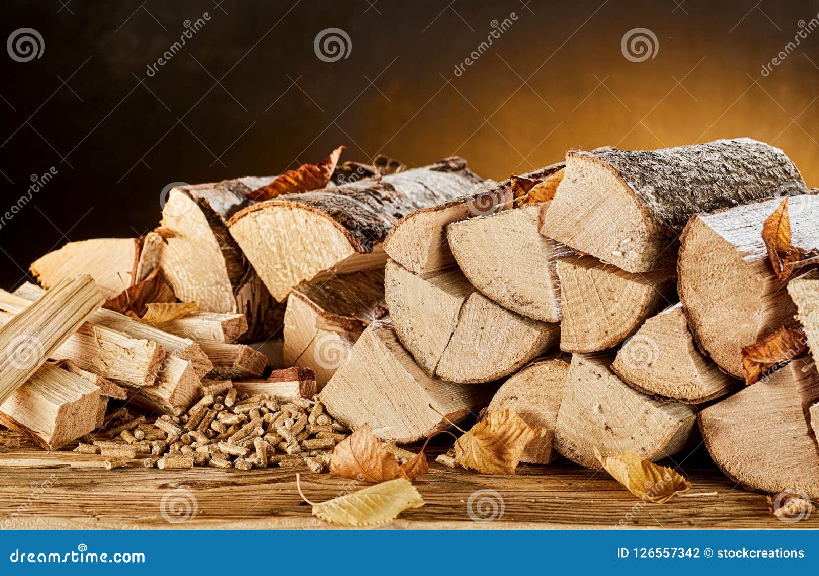 Stack of Wood Logs Sitting on Top of Table Stock Photo - Image of ...