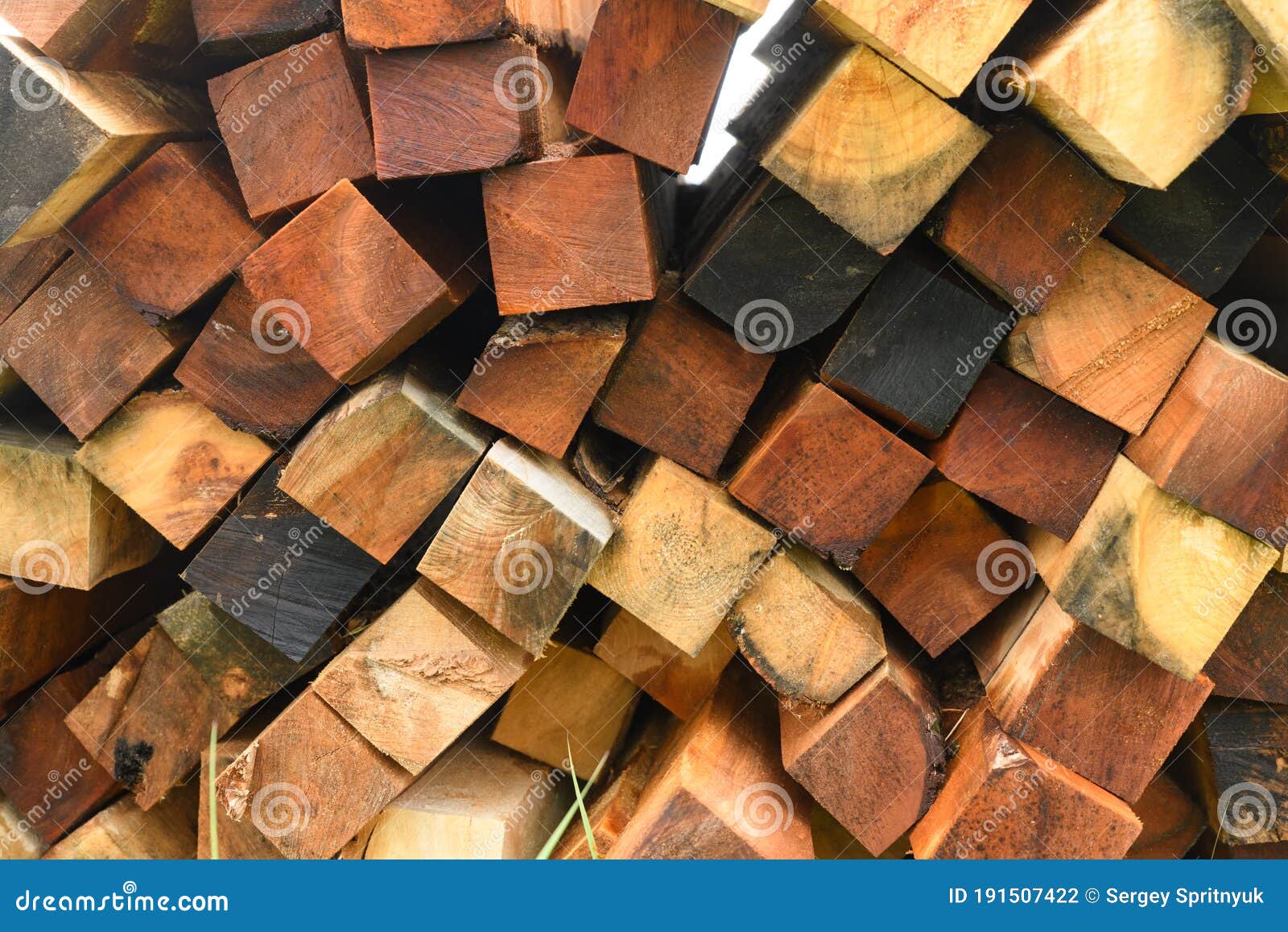 Stack of Wooden Bars in Warehouse. Stacked Wooden Beams of Square ...