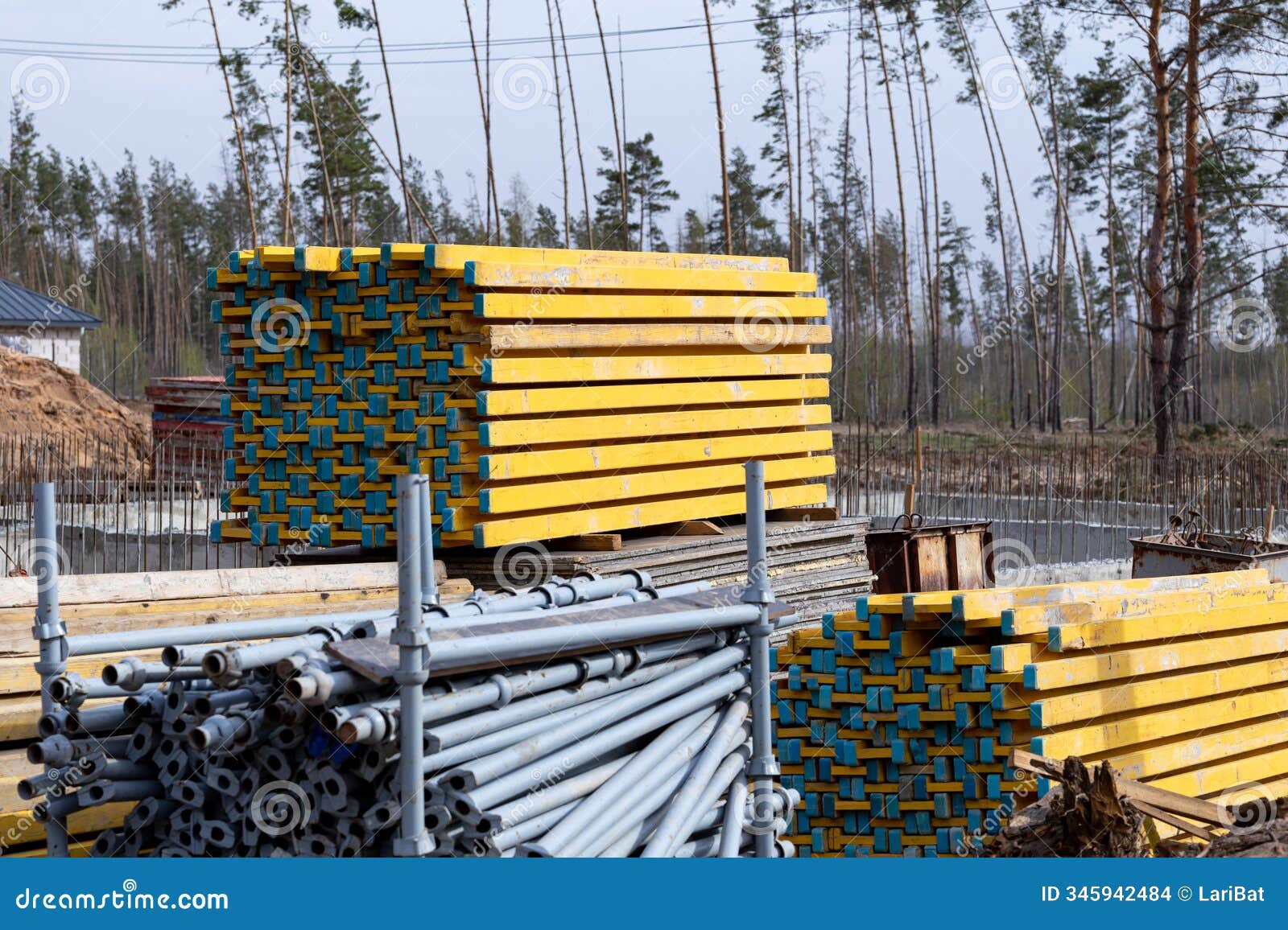 Stack of Wooden Beams and Metal Pipes for Framing or Structural Support ...